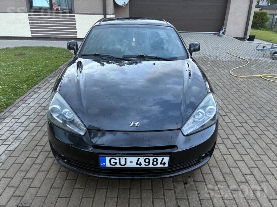 Melns Hyundai Coupe 2007 Rīga, ar dzinēja tilpumu 2.00 L un nobraukumu 204 tūkst. km par 3200 €, foto 7 vietnē AUTOMOTO.COM.LV