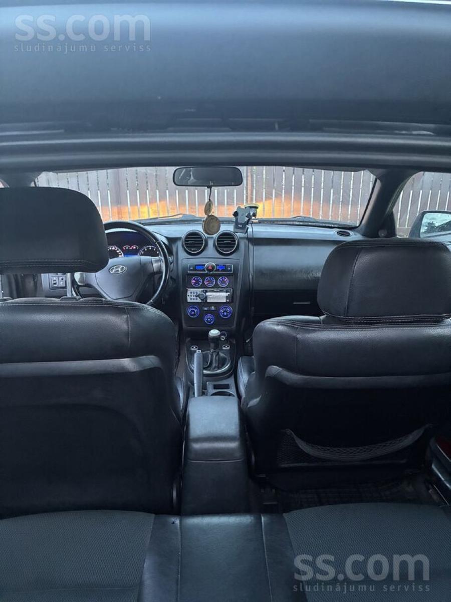 Melns Hyundai Coupe 2007 Rīga, ar dzinēja tilpumu 2.00 L un nobraukumu 204 tūkst. km par 3200 €, foto 9 vietnē AUTOMOTO.COM.LV