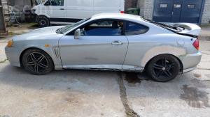 Pelēks Hyundai Coupe 2003 Jelgava, ar dzinēja tilpumu 2.00 L un nobraukumu 248 tūkst. km par 1800 €, foto 4 vietnē AUTOMOTO.COM.LV