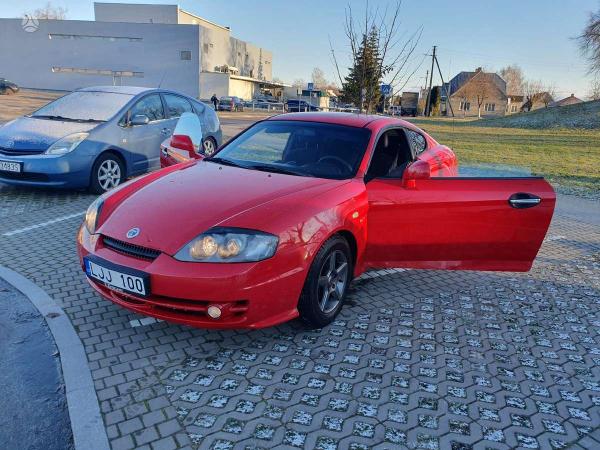 Sarkans Hyundai Coupe 2003 Vilkaviškis, ar dzinēja tilpumu 1.60 L un nobraukumu 210 tūkst. km par 1999 €, foto 1 vietnē AUTOMOTO.COM.LV
