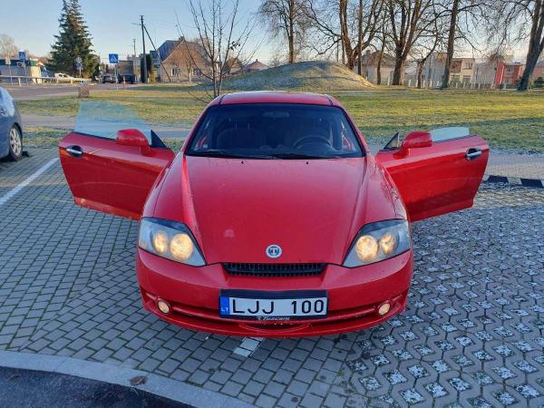 Sarkans Hyundai Coupe 2003 Vilkaviškis, ar dzinēja tilpumu 1.60 L un nobraukumu 210 tūkst. km par 1999 €, foto 2 vietnē AUTOMOTO.COM.LV