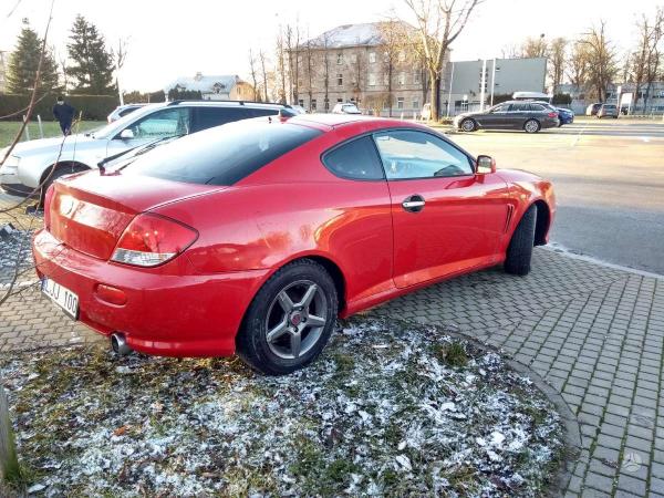 Sarkans Hyundai Coupe 2003 Vilkaviškis, ar dzinēja tilpumu 1.60 L un nobraukumu 210 tūkst. km par 1999 €, foto 7 vietnē AUTOMOTO.COM.LV