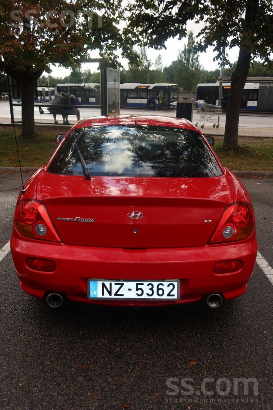 Red Hyundai Coupe 2004 in Riga, with an engine capacity of 2.00 L and mileage of 213 thousand km for 800 €, photo 3 on AUTOMOTO.COM.LV