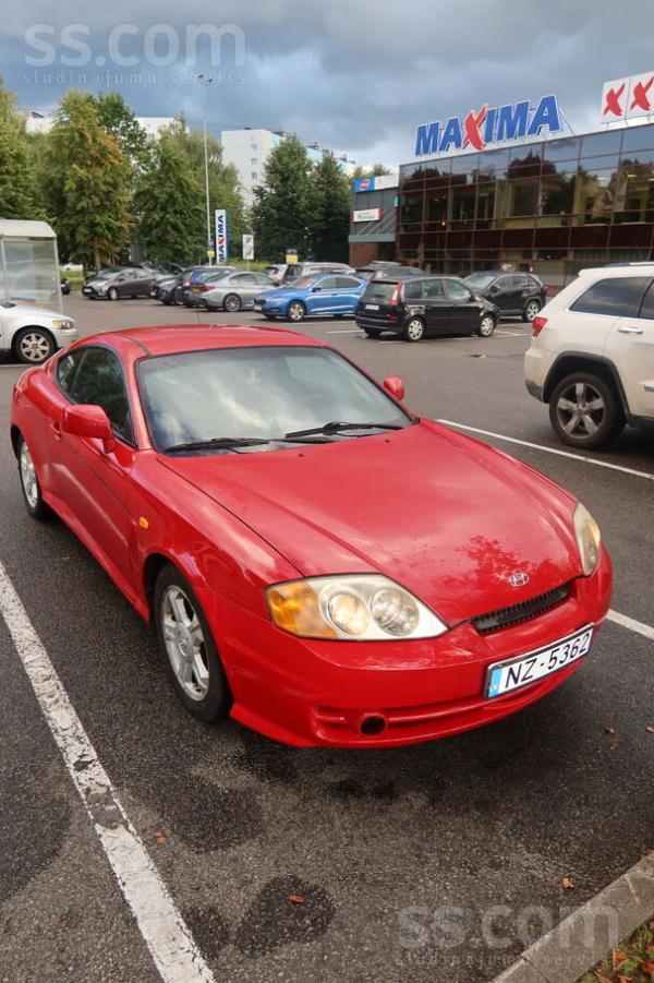 Red Hyundai Coupe 2004 in Riga, with an engine capacity of 2.00 L and mileage of 213 thousand km for 800 €, photo 7 on AUTOMOTO.COM.LV