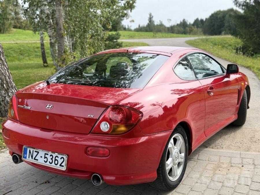 Red Hyundai Coupe 2004 in Cesis, with an engine capacity of 2.00 L and mileage of 214 thousand km for 1600 €, photo 5 on AUTOMOTO.COM.LV