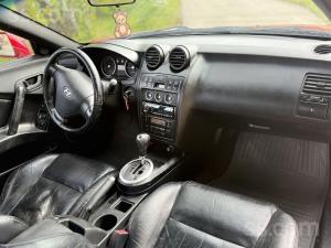Red Hyundai Coupe 2004 in Cesis, with an engine capacity of 2.00 L and mileage of 214 thousand km for 1600 €, photo 8 on AUTOMOTO.COM.LV