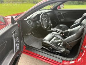 Red Hyundai Coupe 2004 in Cesis, with an engine capacity of 2.00 L and mileage of 214 thousand km for 1600 €, photo 9 on AUTOMOTO.COM.LV