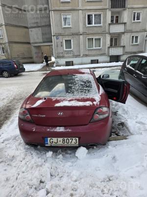 Red Hyundai Coupe 2007 in Riga, with an engine capacity of 2.00 L and mileage of 269 thousand km for 450 €, photo 3 on AUTOMOTO.COM.LV