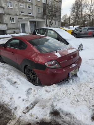 Red Hyundai Coupe 2007 in Riga, with an engine capacity of 2.00 L and mileage of 269 thousand km for 450 €, photo 4 on AUTOMOTO.COM.LV