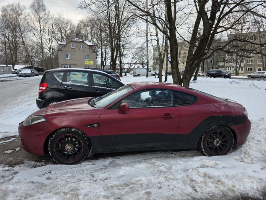 Red Hyundai Coupe 2007 in Riga, with an engine capacity of 2.00 L and mileage of 269 thousand km for 450 €, photo 5 on AUTOMOTO.COM.LV