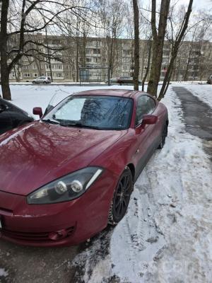 Red Hyundai Coupe 2007 in Riga, with an engine capacity of 2.00 L and mileage of 269 thousand km for 450 €, photo 6 on AUTOMOTO.COM.LV
