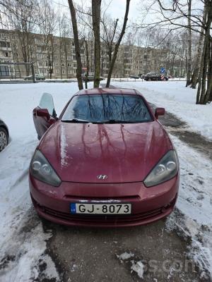 Red Hyundai Coupe 2007 in Riga, with an engine capacity of 2.00 L and mileage of 269 thousand km for 450 €, photo 7 on AUTOMOTO.COM.LV