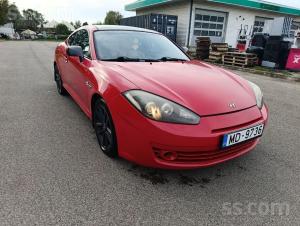 Sarkans Hyundai Coupe 2007 Rīga, ar dzinēja tilpumu 2.00 L un nobraukumu 257 tūkst. km par 1600 €, foto 6 vietnē AUTOMOTO.COM.LV