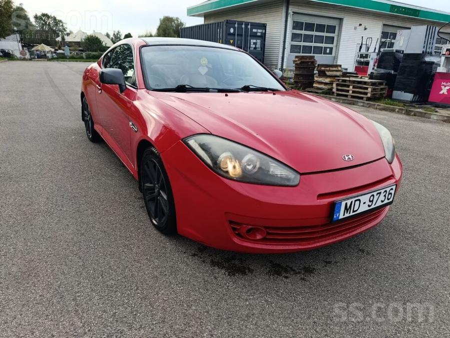 Sarkans Hyundai Coupe 2007 Rīga, ar dzinēja tilpumu 2.00 L un nobraukumu 257 tūkst. km par 1600 €, foto 6 vietnē AUTOMOTO.COM.LV