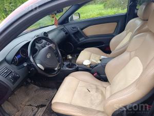 Sarkans Hyundai Coupe 2007 Rīga, ar dzinēja tilpumu 2.00 L un nobraukumu 257 tūkst. km par 1600 €, foto 9 vietnē AUTOMOTO.COM.LV