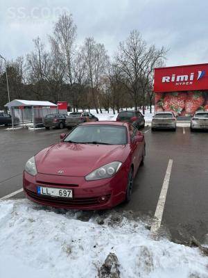 Red Hyundai Coupe 2008 in Riga, with an engine capacity of 1.80 L and mileage of 216 thousand km for 3200 €, photo 6 on AUTOMOTO.COM.LV