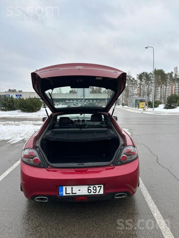 Red Hyundai Coupe 2008 in Riga, with an engine capacity of 1.80 L and mileage of 216 thousand km for 3200 €, photo 7 on AUTOMOTO.COM.LV