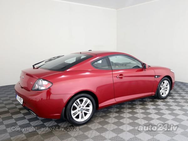 Sarkans Hyundai Coupe 2010 Tallina, ar dzinēja tilpumu 2.00 L un nobraukumu 67 tūkst. km par 3499 €, foto 3 vietnē AUTOMOTO.COM.LV