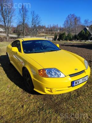 Yellow Hyundai Coupe 2003 in Aizkraukle, with an engine capacity of 2.70 L and mileage of 193 thousand km for 1500 €, photo  on AUTOMOTO.COM.LV