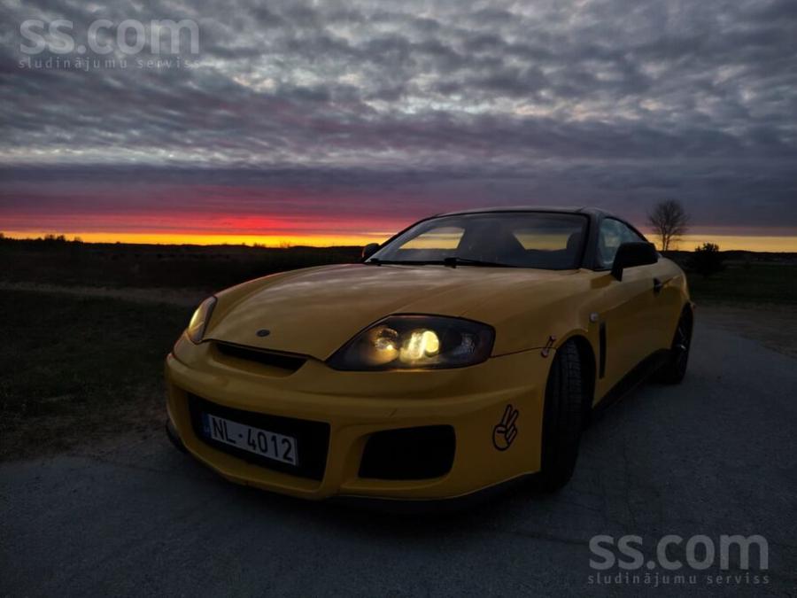 Yellow Hyundai Coupe 2003 in Riga, with an engine capacity of 2.70 L and mileage of 195 thousand km for 2700 €, photo 1 on AUTOMOTO.COM.LV