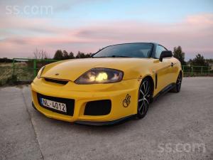 Yellow Hyundai Coupe 2003 in Riga, with an engine capacity of 2.70 L and mileage of 195 thousand km for 2700 €, photo 4 on AUTOMOTO.COM.LV