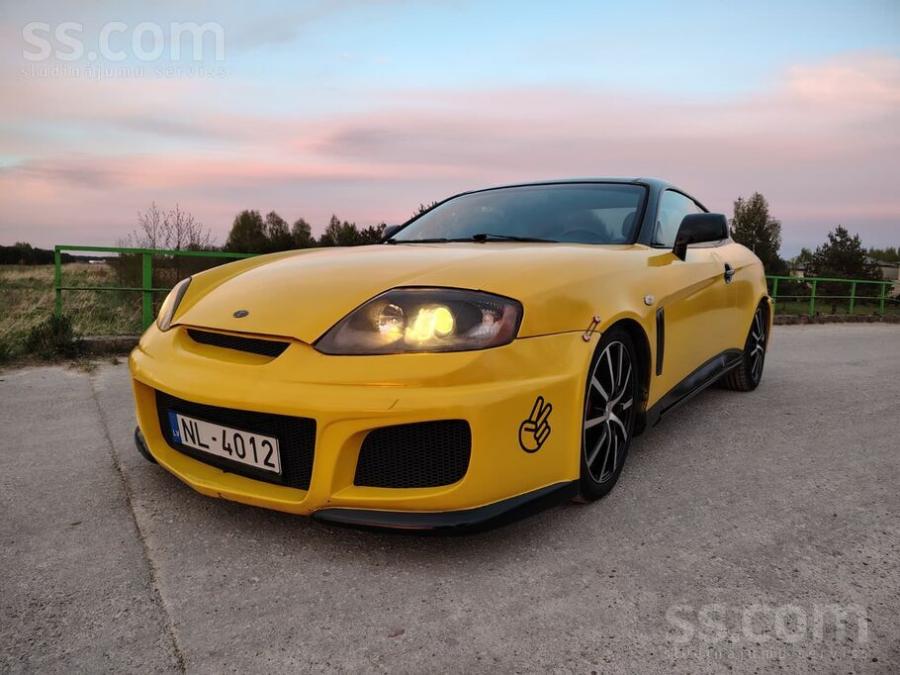Yellow Hyundai Coupe 2003 in Riga, with an engine capacity of 2.70 L and mileage of 195 thousand km for 2700 €, photo 4 on AUTOMOTO.COM.LV