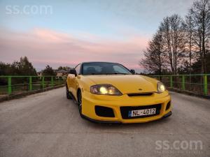 Yellow Hyundai Coupe 2003 in Riga, with an engine capacity of 2.70 L and mileage of 195 thousand km for 2700 €, photo 5 on AUTOMOTO.COM.LV