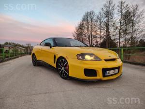 Yellow Hyundai Coupe 2003 in Riga, with an engine capacity of 2.70 L and mileage of 195 thousand km for 2700 €, photo 6 on AUTOMOTO.COM.LV