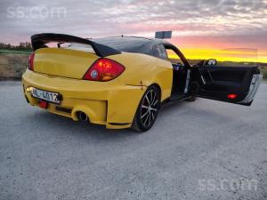 Yellow Hyundai Coupe 2003 in Riga, with an engine capacity of 2.70 L and mileage of 195 thousand km for 2700 €, photo 7 on AUTOMOTO.COM.LV