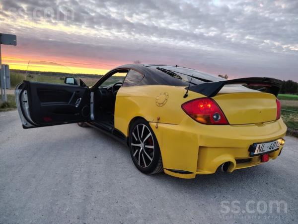 Yellow Hyundai Coupe 2003 in Riga, with an engine capacity of 2.70 L and mileage of 195 thousand km for 2700 €, photo 7 on AUTOMOTO.COM.LV