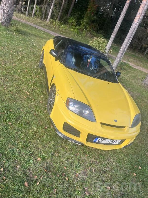 Hyundai Coupe 2003 Liepāja vietnē Dzeltens Hyundai Coupe 2003 Liepāja, ar dzinēja tilpumu 2.70 L un nobraukumu 201 tūkst. km par 1500 €, foto 3 vietnē AUTOMOTO.COM.LV