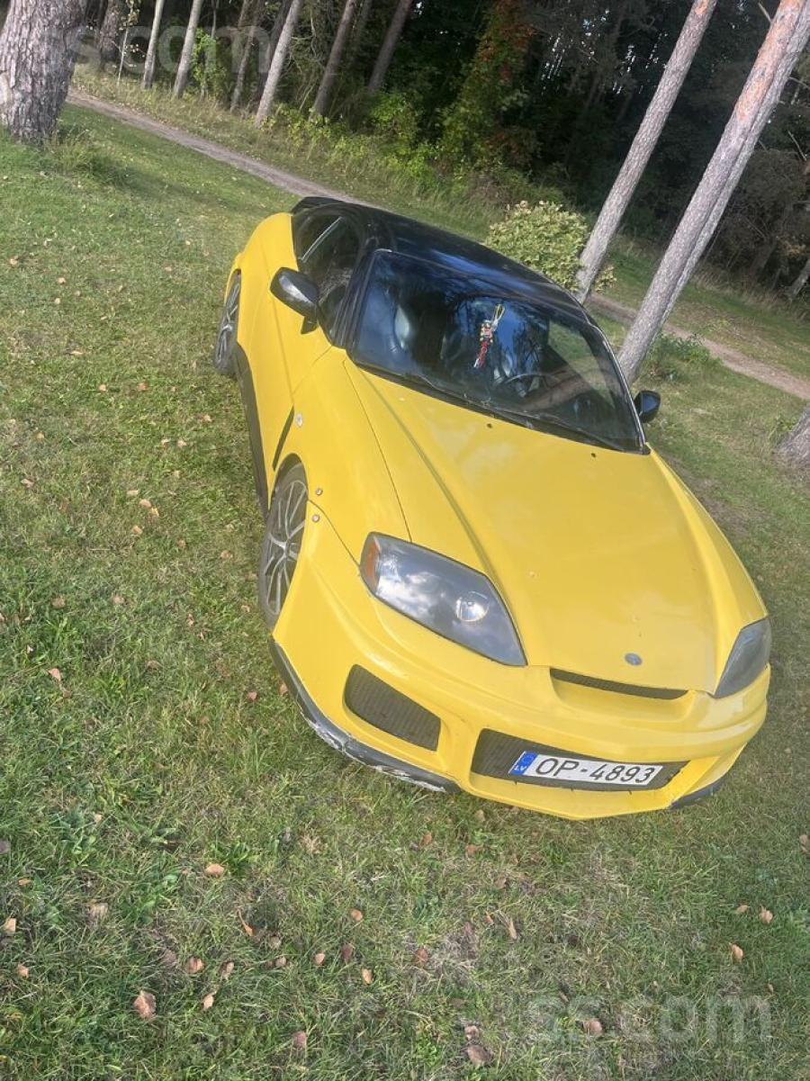 Dzeltens Hyundai Coupe 2003 Liepāja, ar dzinēja tilpumu 2.70 L un nobraukumu 201 tūkst. km par 1500 €, foto 3 vietnē AUTOMOTO.COM.LV