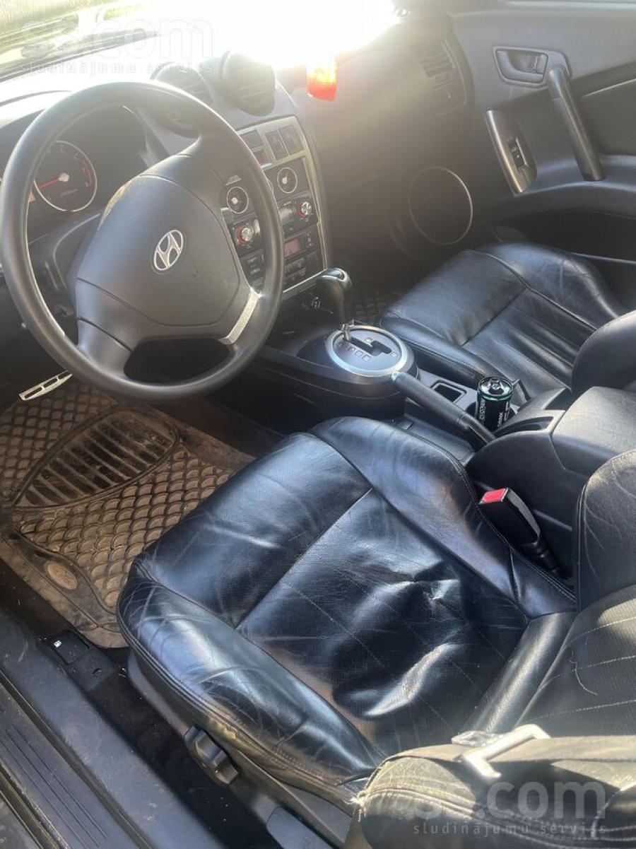 Dzeltens Hyundai Coupe 2003 Liepāja, ar dzinēja tilpumu 2.70 L un nobraukumu 201 tūkst. km par 1500 €, foto 6 vietnē AUTOMOTO.COM.LV