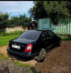 Black Hyundai Elantra 2004 in Riga, with an engine capacity of 1.60 L and mileage of 206 thousand km for 3200 €, photo 17 on AUTOMOTO.COM.LV