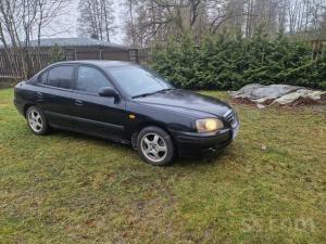 Black Hyundai Elantra 2006 in Riga, with an engine capacity of 1.60 L and mileage of 152 thousand km for 1100 €, photo  on AUTOMOTO.COM.LV