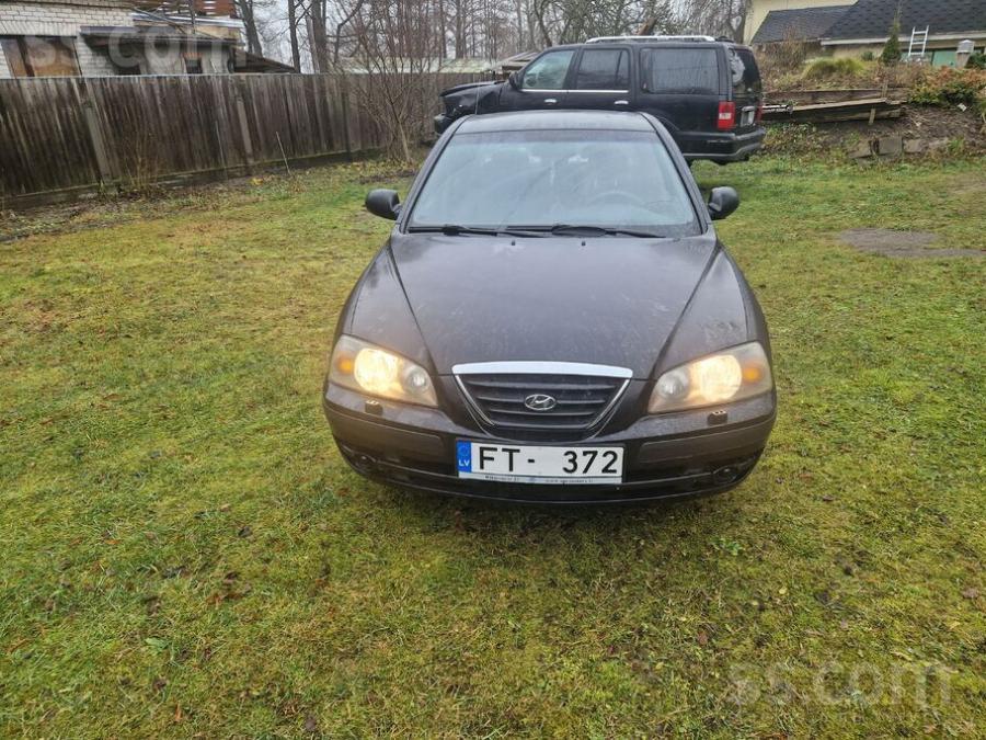 Melns Hyundai Elantra 2006 Rīga, ar dzinēja tilpumu 1.60 L un nobraukumu 152 tūkst. km par 1100 €, foto 3 vietnē AUTOMOTO.COM.LV