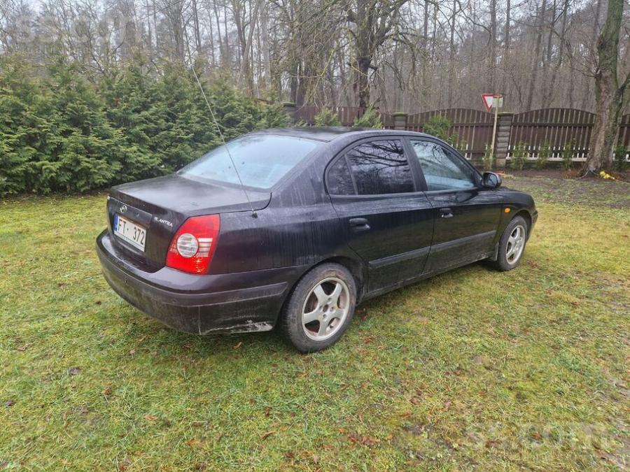 Melns Hyundai Elantra 2006 Rīga, ar dzinēja tilpumu 1.60 L un nobraukumu 152 tūkst. km par 1100 €, foto 4 vietnē AUTOMOTO.COM.LV