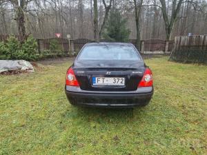 Melns Hyundai Elantra 2006 Rīga, ar dzinēja tilpumu 1.60 L un nobraukumu 152 tūkst. km par 1100 €, foto 5 vietnē AUTOMOTO.COM.LV