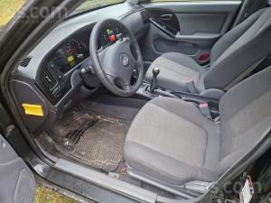 Melns Hyundai Elantra 2006 Rīga, ar dzinēja tilpumu 1.60 L un nobraukumu 152 tūkst. km par 1100 €, foto 7 vietnē AUTOMOTO.COM.LV