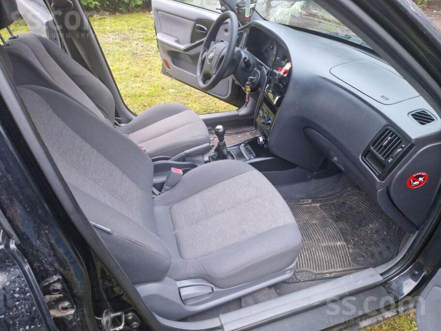 Melns Hyundai Elantra 2006 Rīga, ar dzinēja tilpumu 1.60 L un nobraukumu 152 tūkst. km par 1100 €, foto 8 vietnē AUTOMOTO.COM.LV
