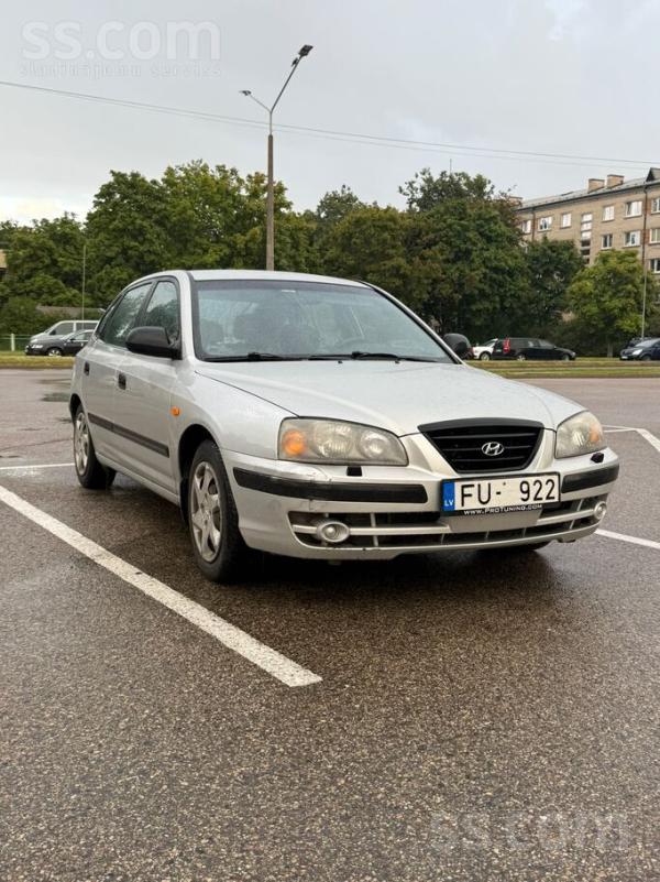 Pelēks Hyundai Elantra 2006 Daugavpils, ar dzinēja tilpumu 1.60 L un nobraukumu 180 tūkst. km par 1100 €, foto 1 vietnē AUTOMOTO.COM.LV