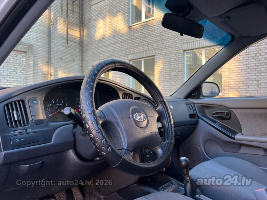 Pelēks Hyundai Elantra 2005 Narva, ar dzinēja tilpumu 1.60 L un nobraukumu 142 tūkst. km par 499 €, foto 16 vietnē AUTOMOTO.COM.LV