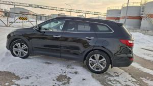 Black Hyundai Grand Santa Fe 2014 in Radviliskis, with an engine capacity of 2.20 L and mileage of 188 thousand km for 13500 €, photo 11 on AUTOMOTO.COM.LV