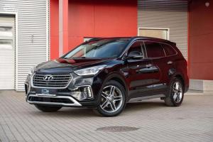 Black Hyundai Grand Santa Fe 2016 in Marijampole, with an engine capacity of 2.20 L and mileage of 154 thousand km for 17850 €, photo 7 on AUTOMOTO.COM.LV