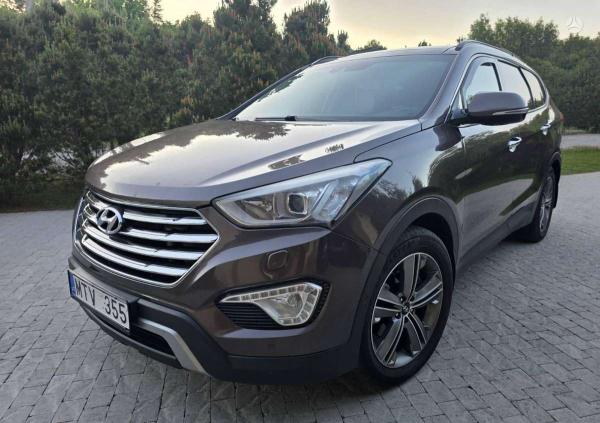 Brūns Hyundai Grand Santa Fe 2015 Utena, ar dzinēja tilpumu 2.20 L un nobraukumu 339 tūkst. km par 6900 €, foto 1 vietnē AUTOMOTO.COM.LV