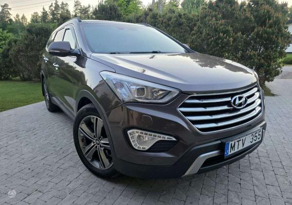 Brūns Hyundai Grand Santa Fe 2015 Utena, ar dzinēja tilpumu 2.20 L un nobraukumu 339 tūkst. km par 6900 €, foto 2 vietnē AUTOMOTO.COM.LV