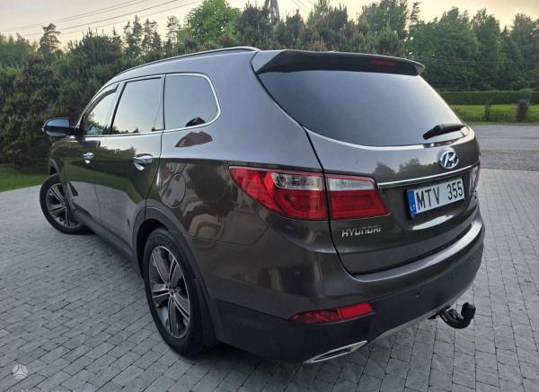 Brūns Hyundai Grand Santa Fe 2015 Utena, ar dzinēja tilpumu 2.20 L un nobraukumu 339 tūkst. km par 6900 €, foto 3 vietnē AUTOMOTO.COM.LV