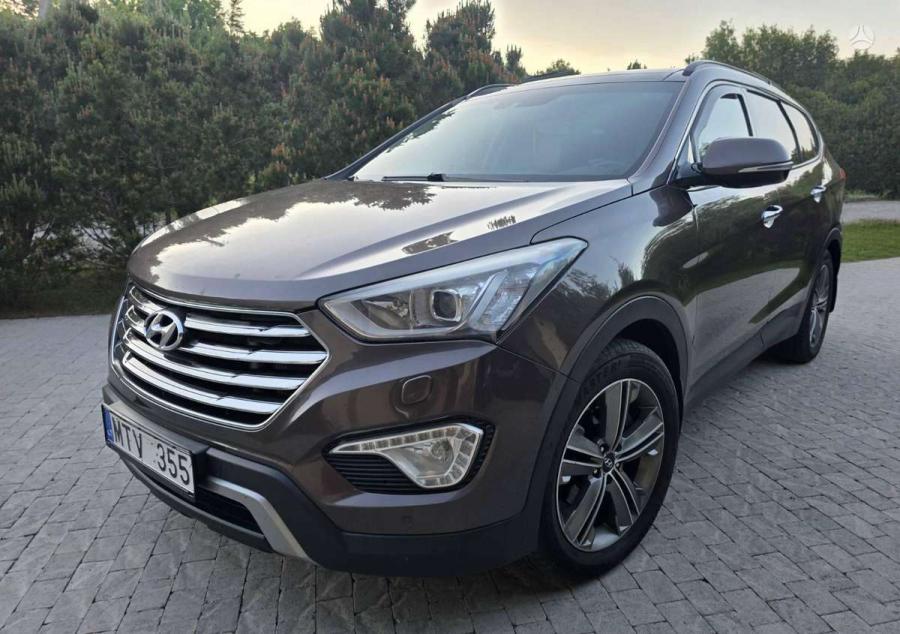 Brūns Hyundai Grand Santa Fe 2015 Utena, ar dzinēja tilpumu 2.20 L un nobraukumu 339 tūkst. km par 6900 €, foto 1 vietnē AUTOMOTO.COM.LV