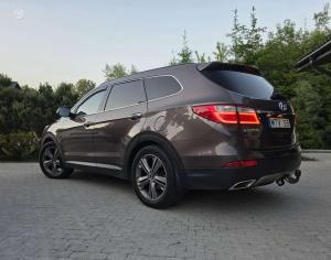 Brūns Hyundai Grand Santa Fe 2015 Utena, ar dzinēja tilpumu 2.20 L un nobraukumu 339 tūkst. km par 6900 €, foto 34 vietnē AUTOMOTO.COM.LV
