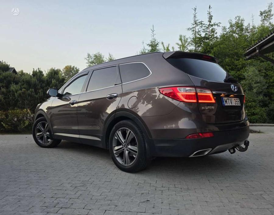 Brūns Hyundai Grand Santa Fe 2015 Utena, ar dzinēja tilpumu 2.20 L un nobraukumu 339 tūkst. km par 6900 €, foto 34 vietnē AUTOMOTO.COM.LV
